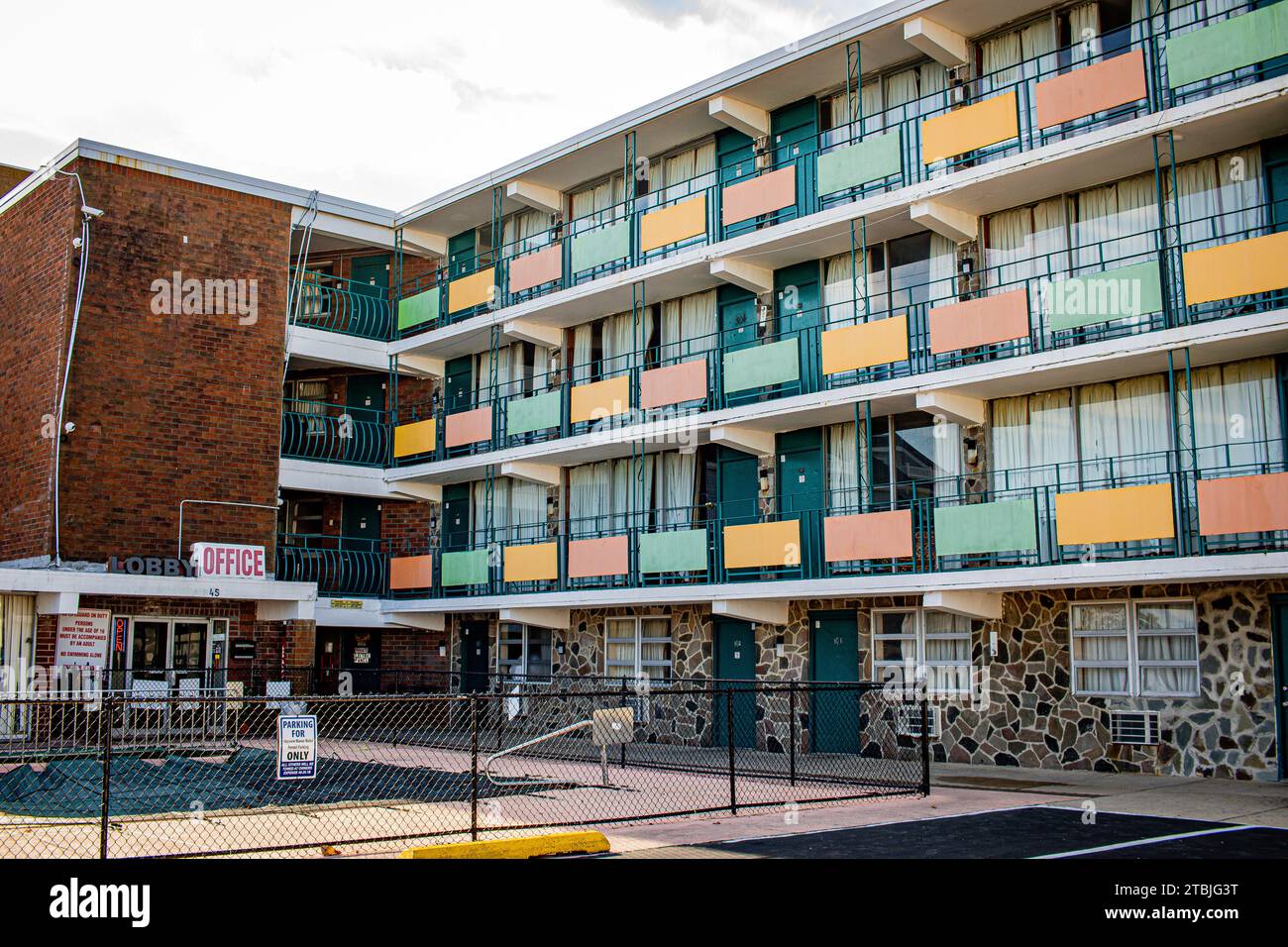 A vibrant, multicolored building with a unique architectural design ...