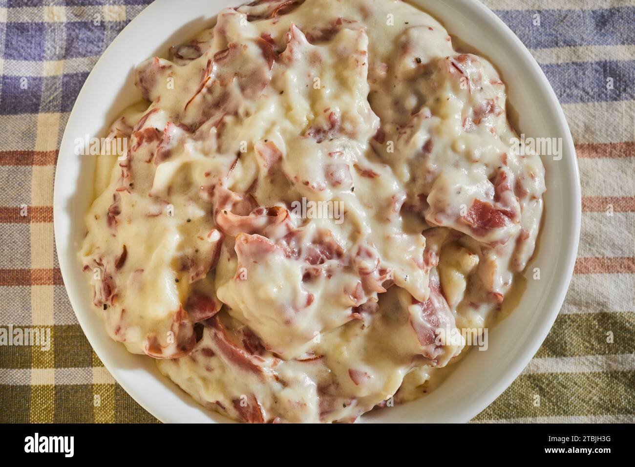 Creamed, chipped beef. A classic American dish made with preserved ...