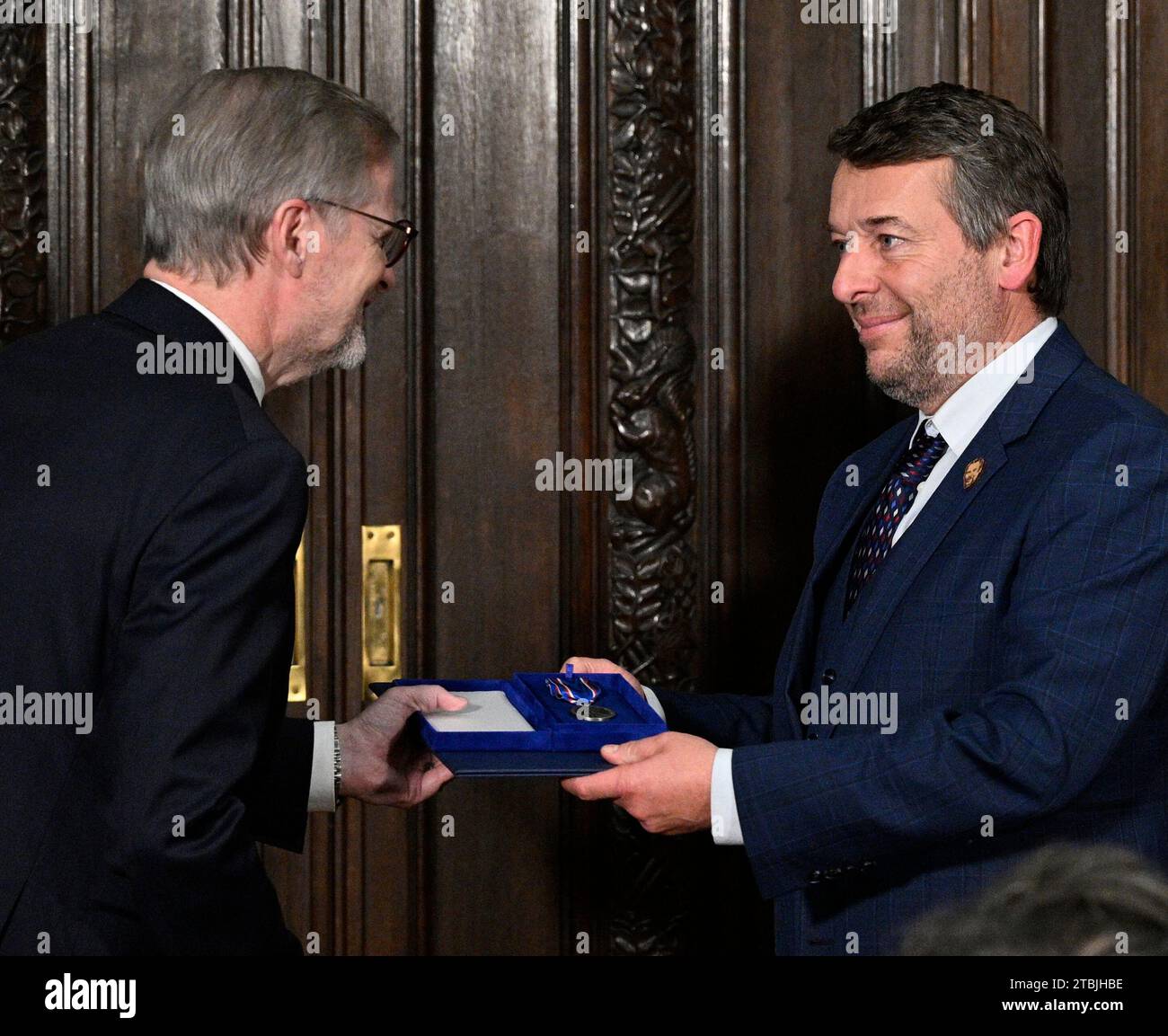 Prague, Czech Republic. 07th Dec, 2023. Prime Minister Petr Fiala, left ...