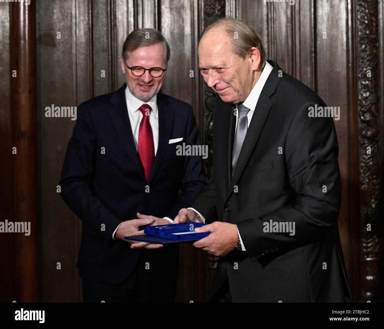 Prague, Czech Republic. 07th Dec, 2023. Prime Minister Petr Fiala, left ...