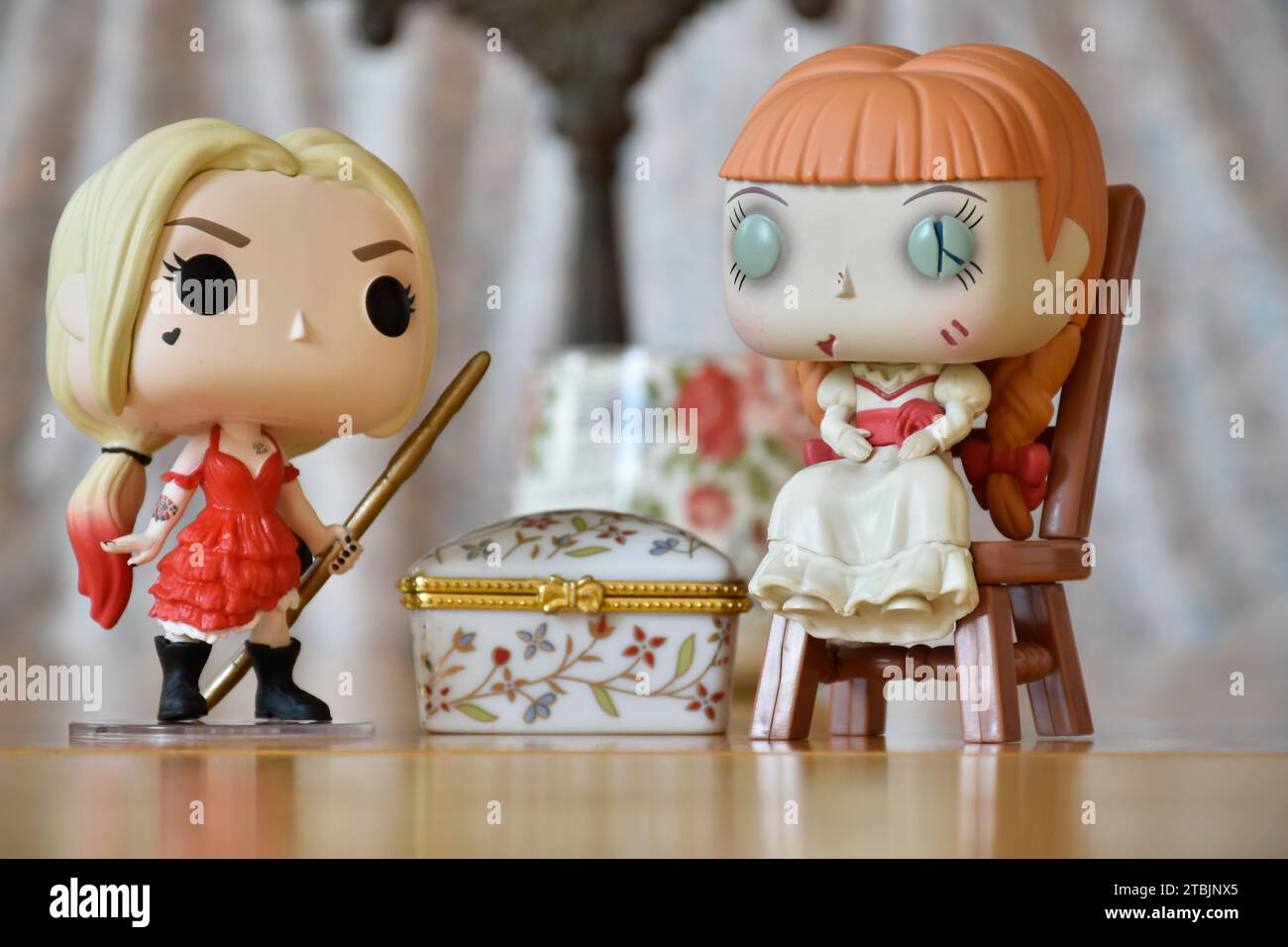 Funko Pop action figures of DC superhero Harley Quinn and horror doll ...