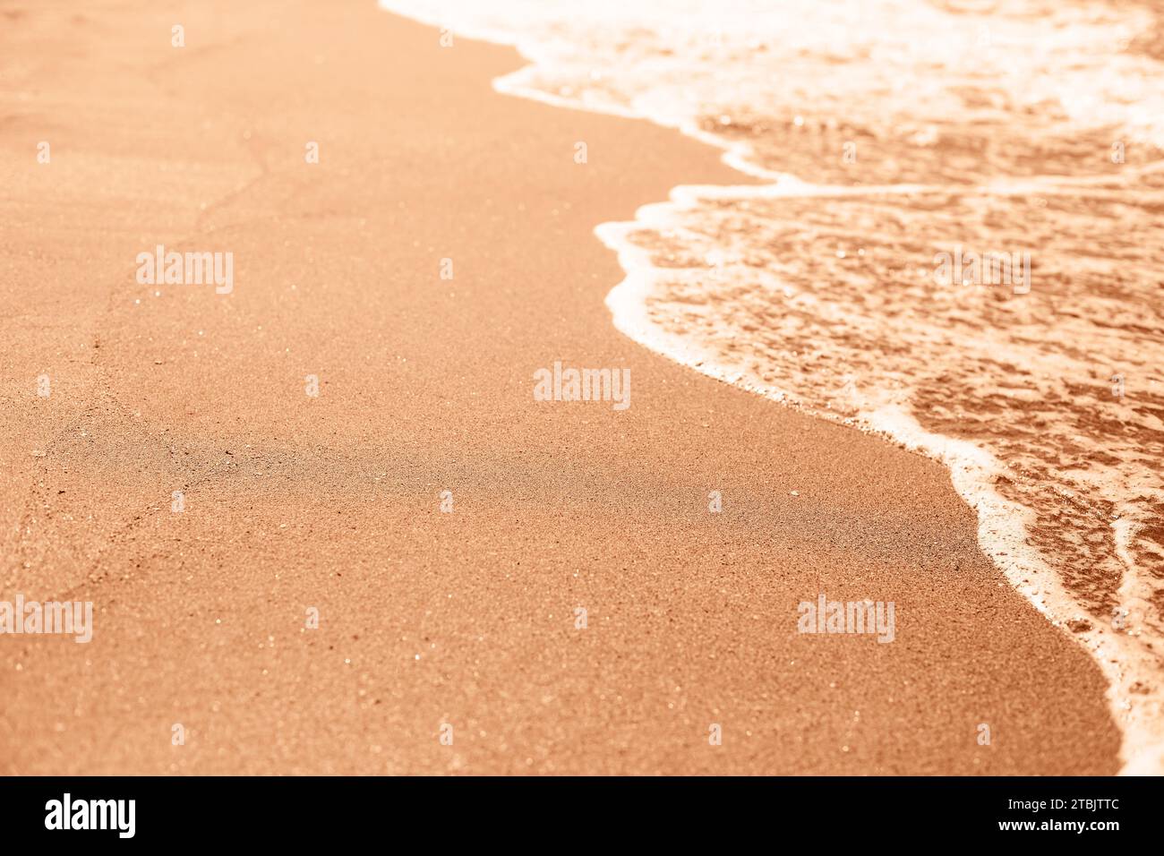 Wave of the pure sea on the sandy beach. Demonstrating color of 2024 ...