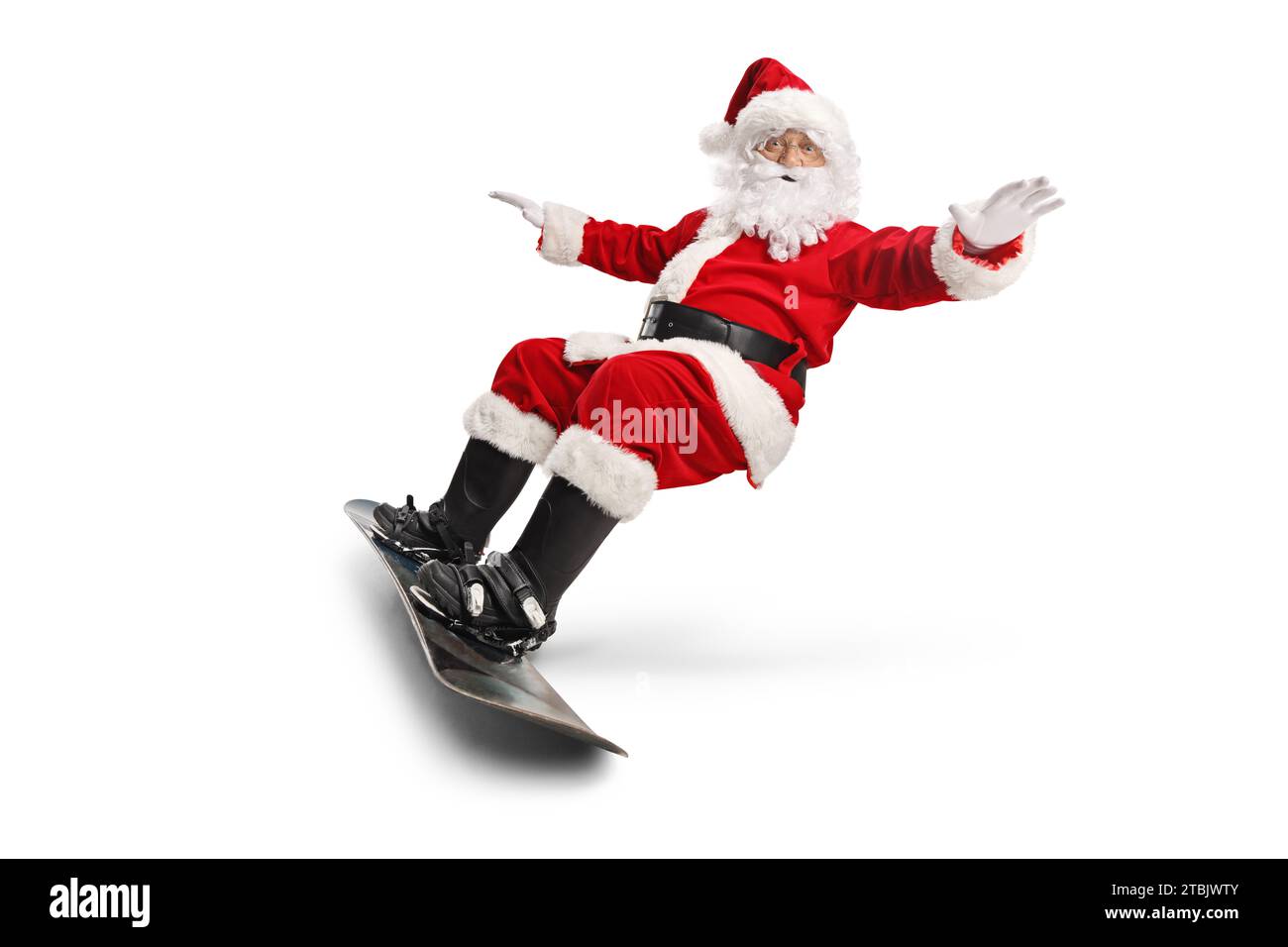 Santa claus riding a snowboard isolated on white background Stock Photo ...