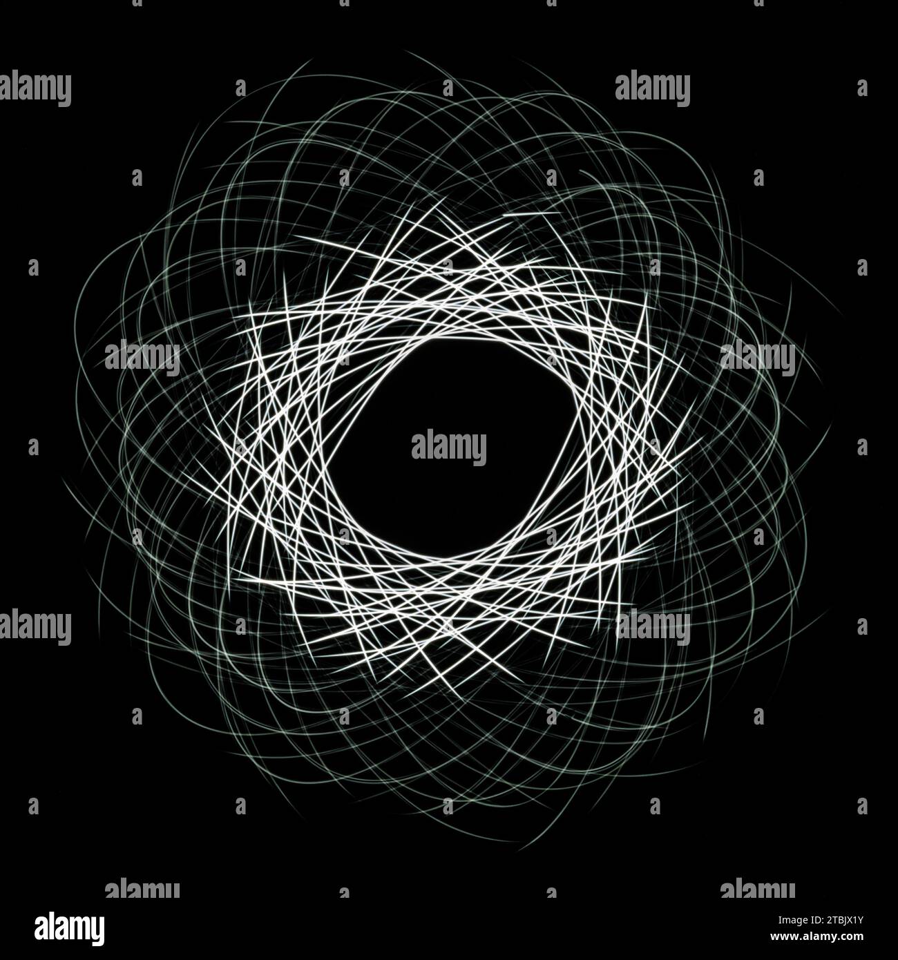 White spirographs photography with light painting on black background ...