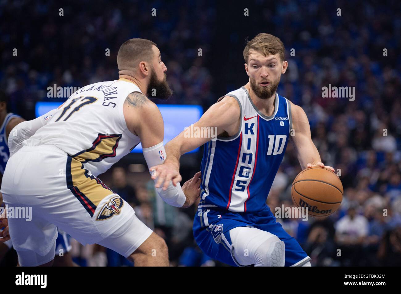 New Orleans Pelicans center Jonas Valanciunas (17) defends Sacramento Kings forward Domantas ...
