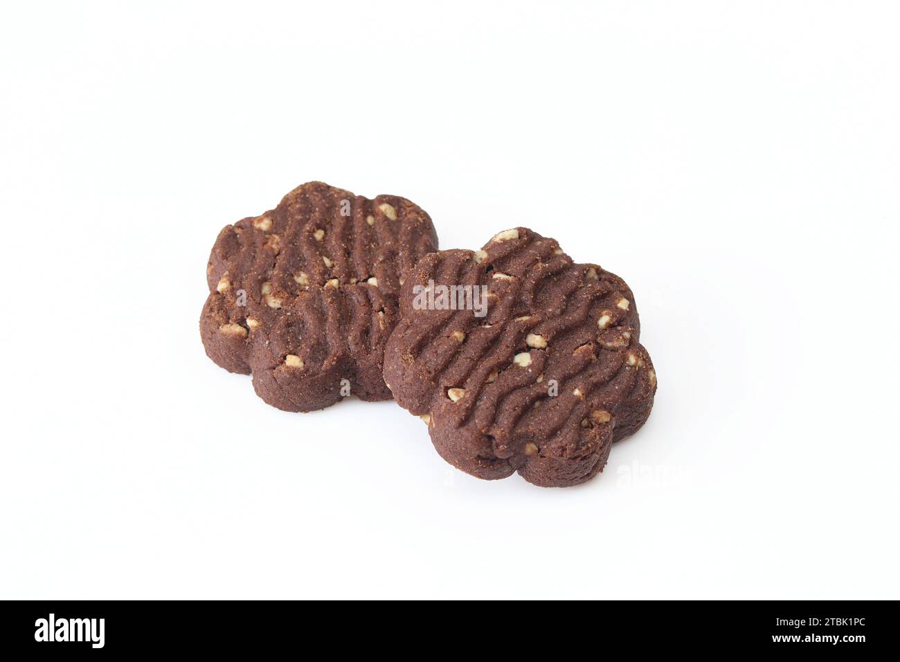 Two flower shape wavy cocoa and puffed rice biscuit isolated on white ...