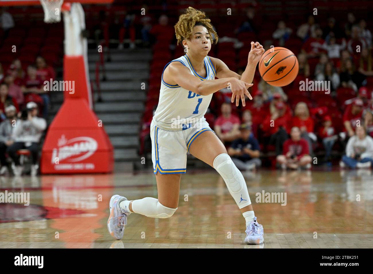 UCLA guard Kiki Rice (1) runs a play against Arkansas during an NCAA ...