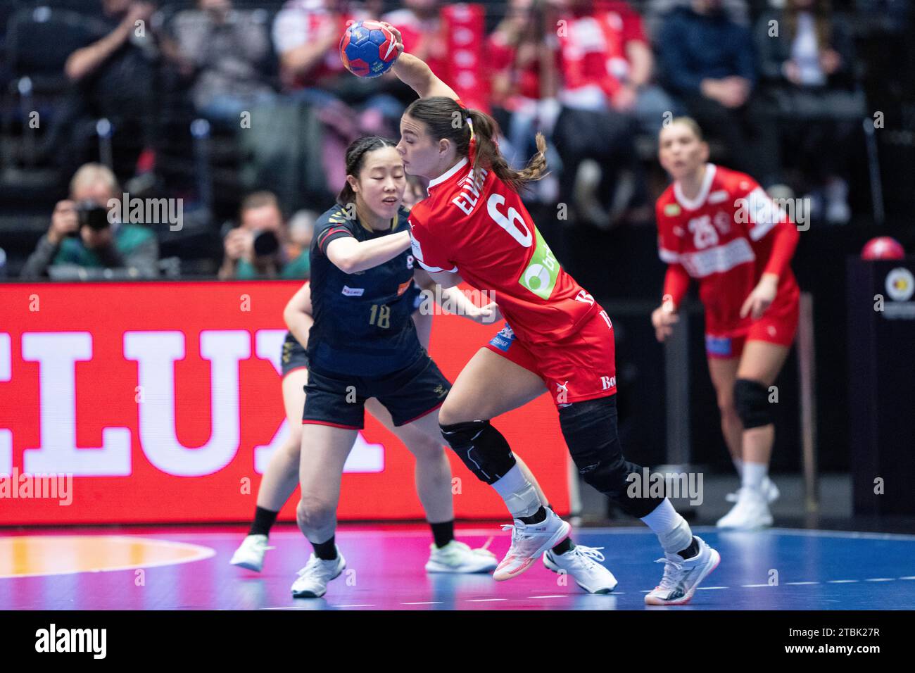 Japans Hikaru Matsumoro and Denmarks Helena Elver during the IHF World Womens Handball ...