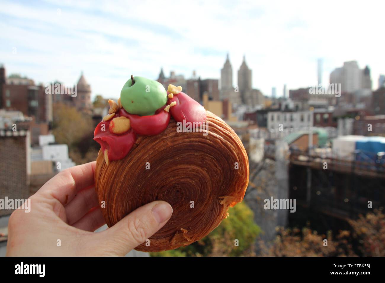 New York, USA. 17th Nov, 2023. A woman holds a "Suprême" - a kind of ...