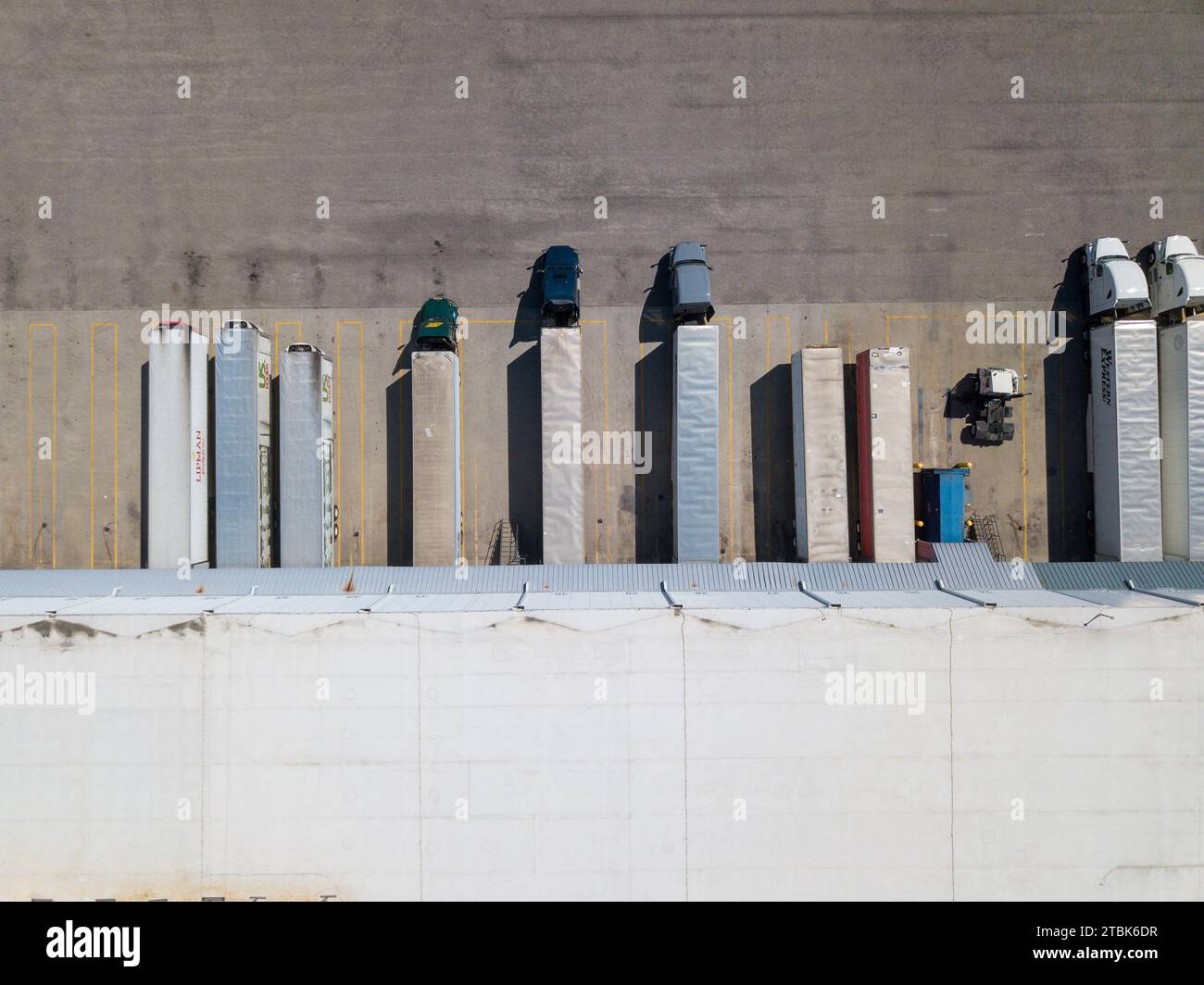 Drone images of the roof of a food distribution warehouse, and a ...