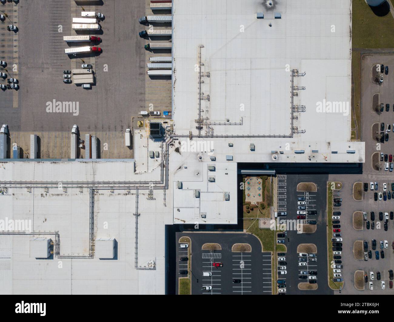 Drone images of the roof of a food distribution warehouse, and a ...