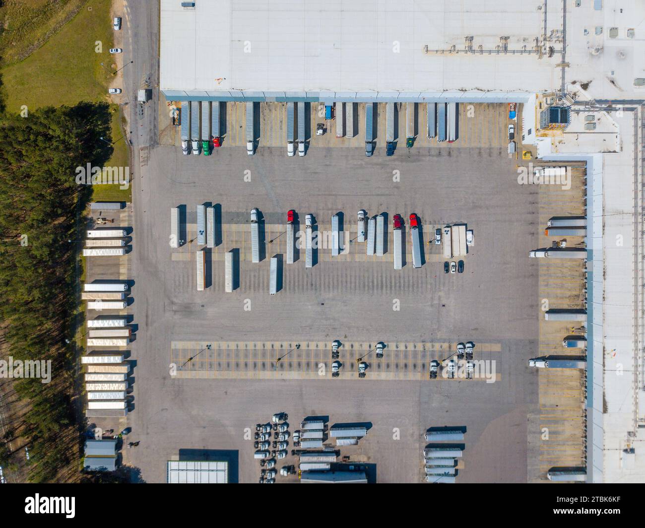 Drone images of the roof of a food distribution warehouse, and a ...