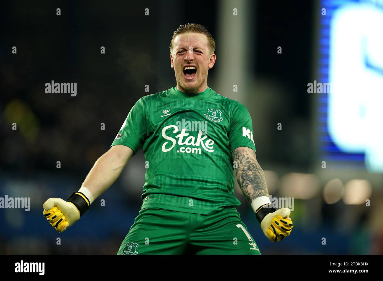 Everton goalkeeper Jordan Pickford celebrates after Dwight McNeil ...