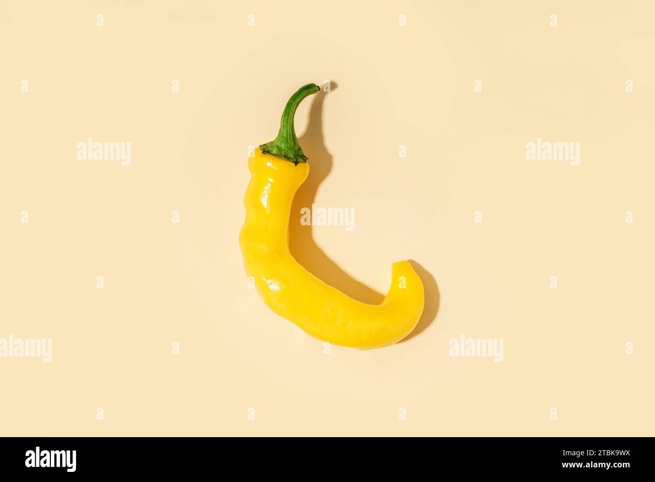 Yellow chili pepper on white background Stock Photo - Alamy