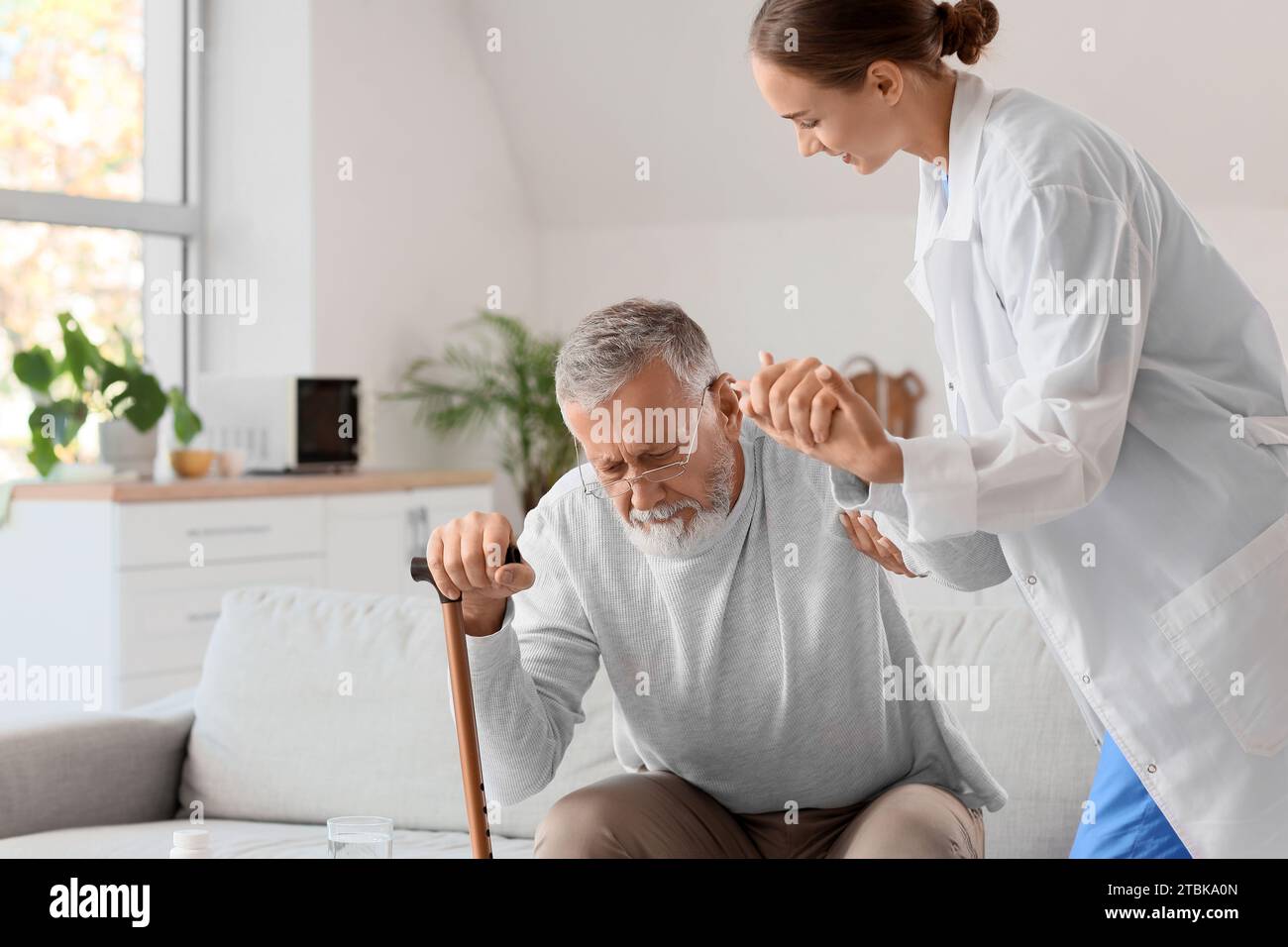 Helping patient stand hi-res stock photography and images - Alamy