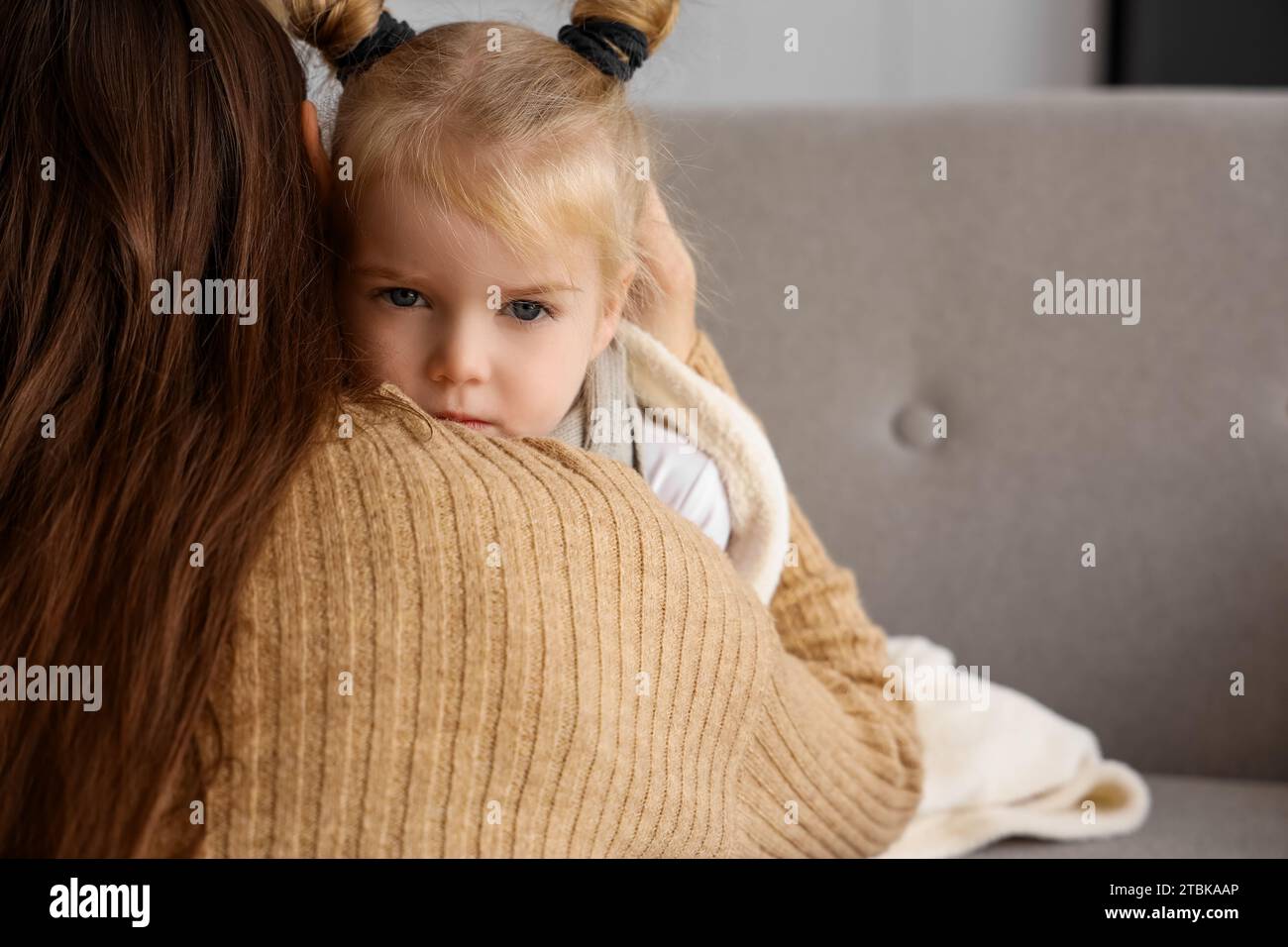 Sick mother hugging children hi-res stock photography and images - Alamy