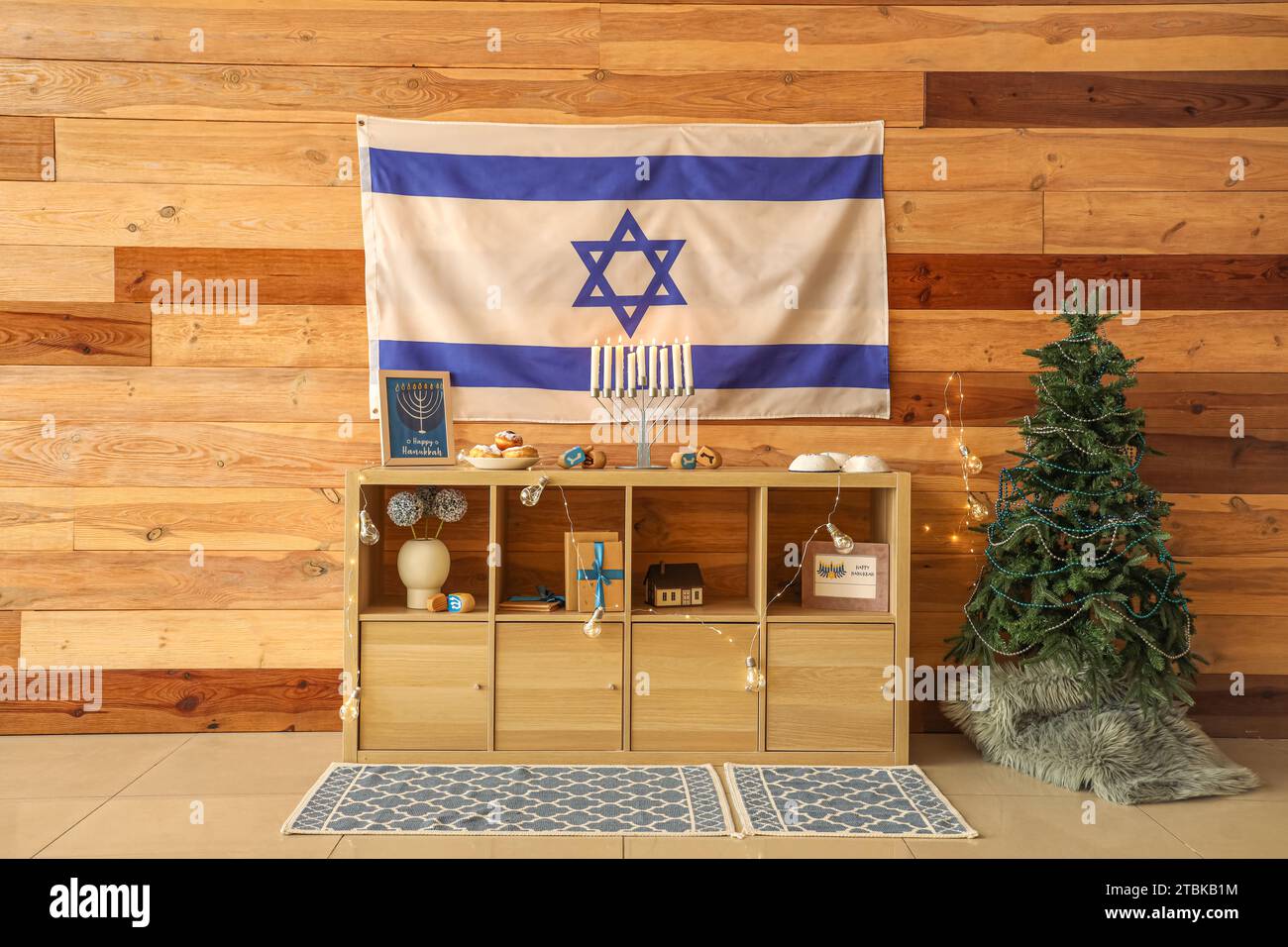 Interior of festive living room with wooden cabinet, Israel flag and ...