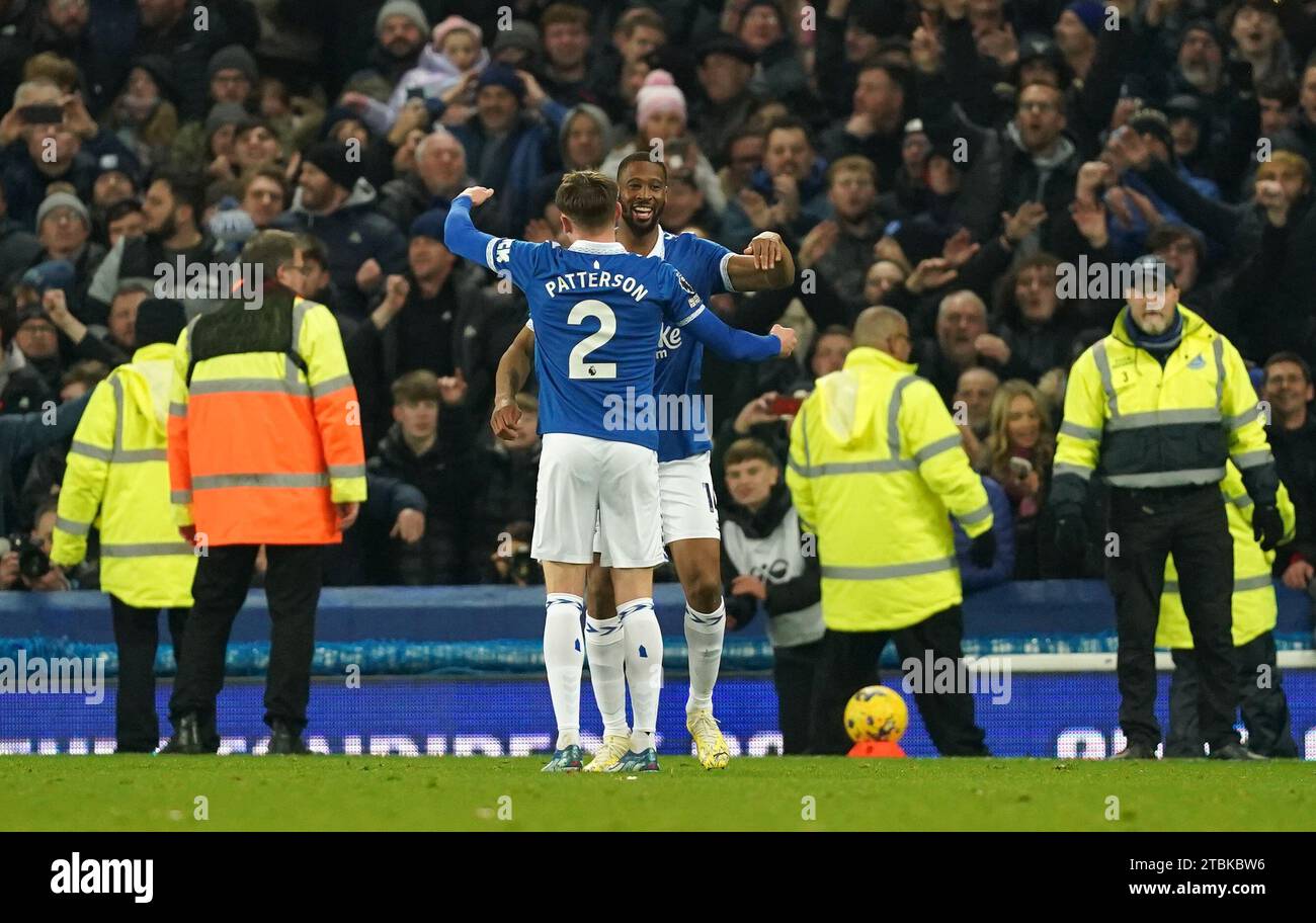 Everton's Beto (right) celebrates scoring their side's third goal of ...