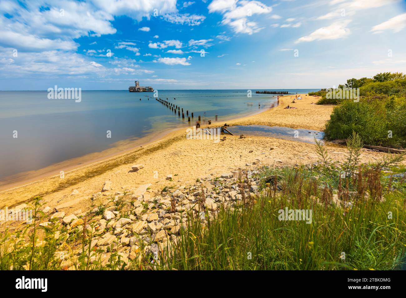 Gdynia, Poland - July 24 2023: Babie Doly beach with old ruins of pier ...