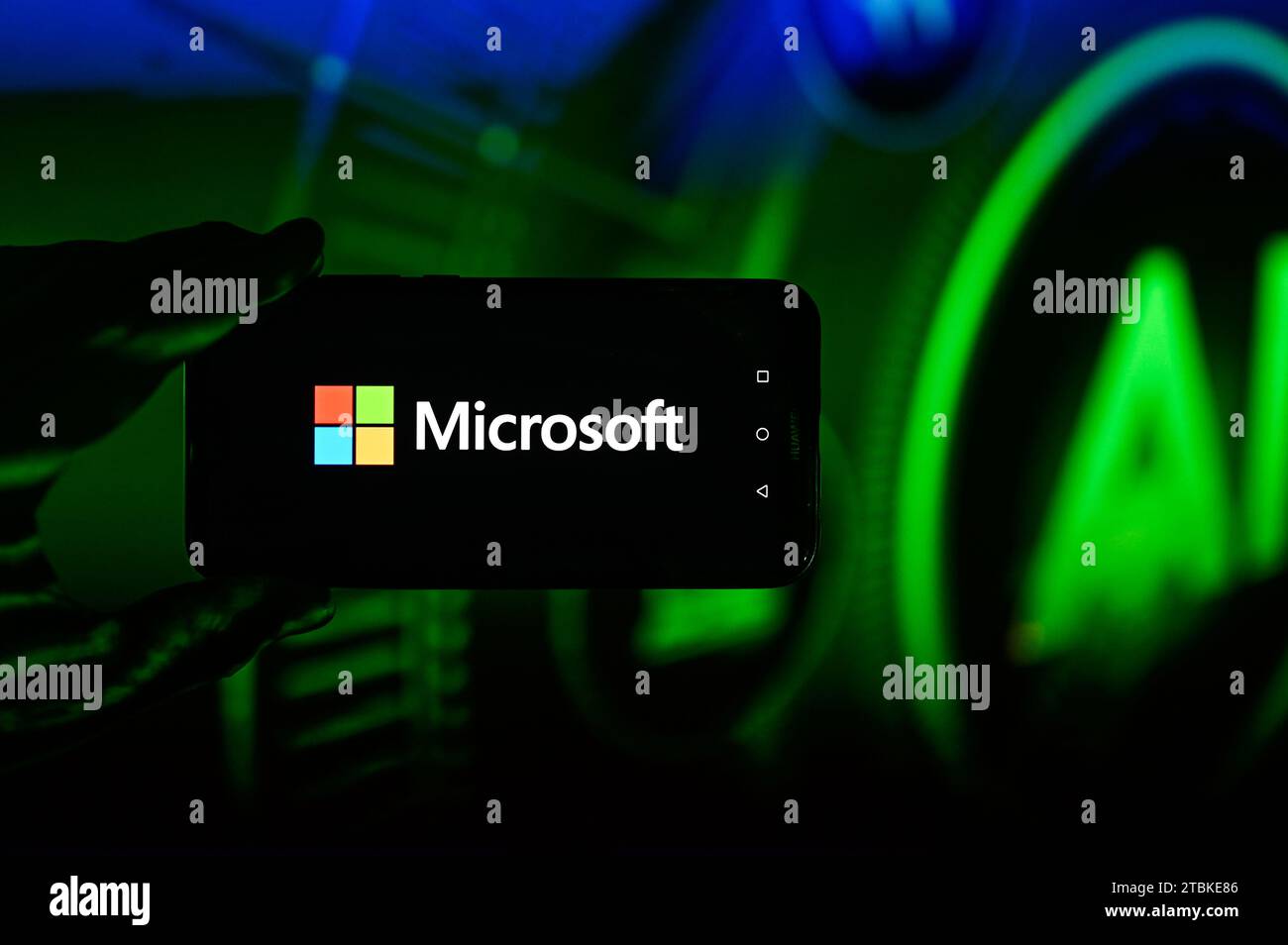 In this photo illustration a Microsoft logo is displayed on a ...