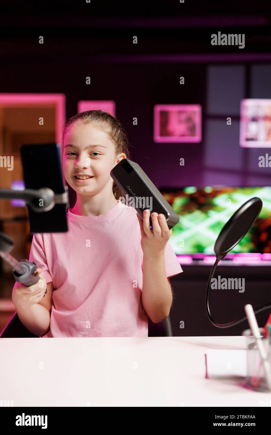 Gen Z media star filming video about best portable speaker launched ...