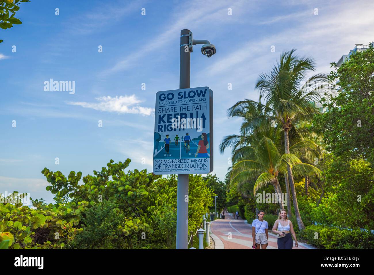 Close up view of adaptive poster on pole along Walking Street, urging ...