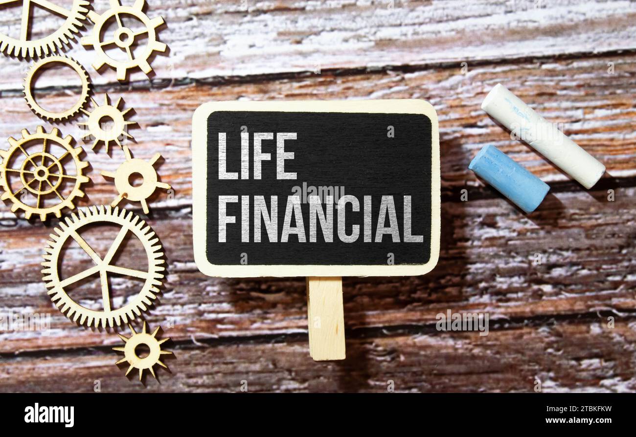 paper with text LIFE FINANCIAL on the shirt Stock Photo - Alamy