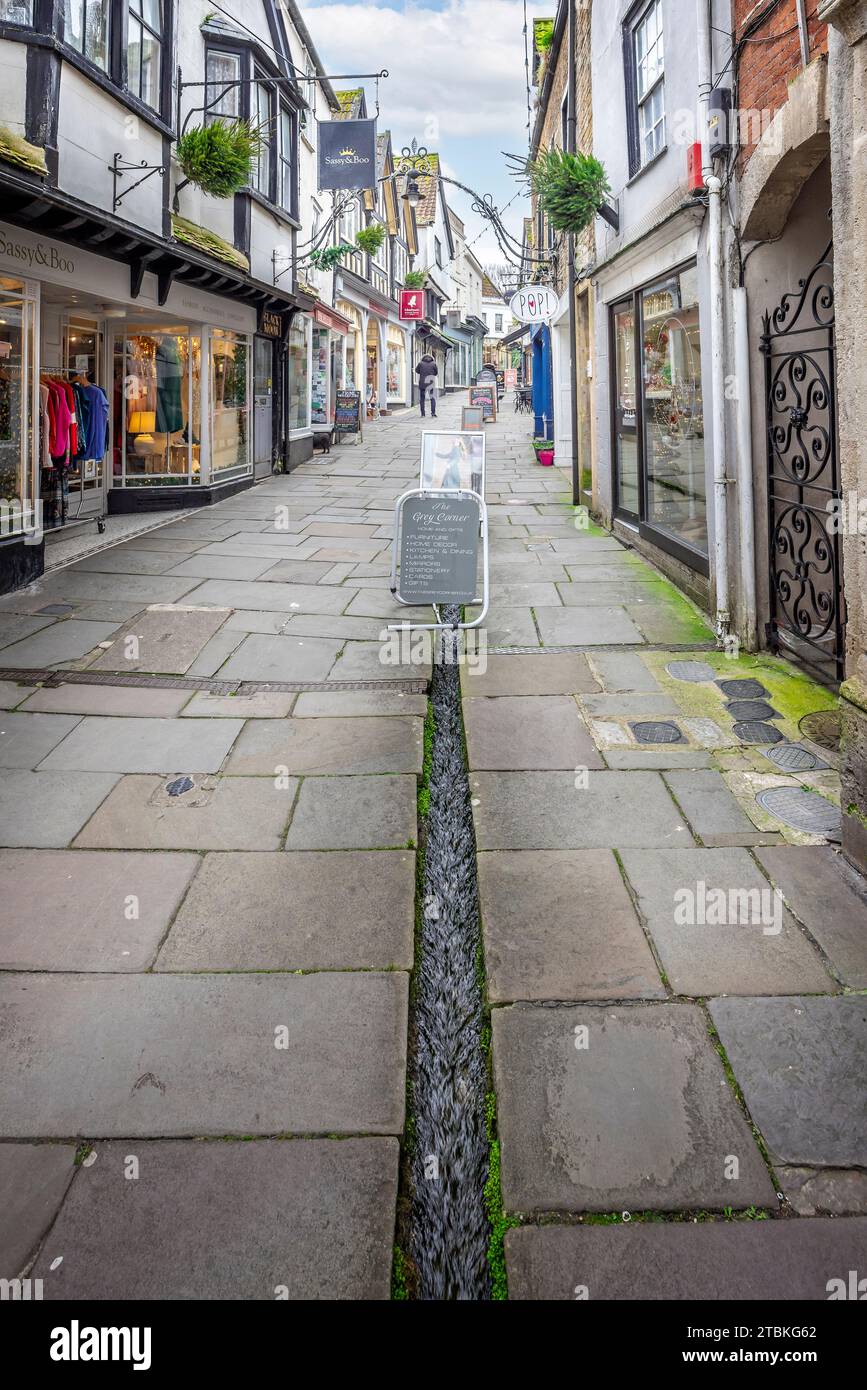 Stream running down middle of historic Cheap Street shopping area in ...