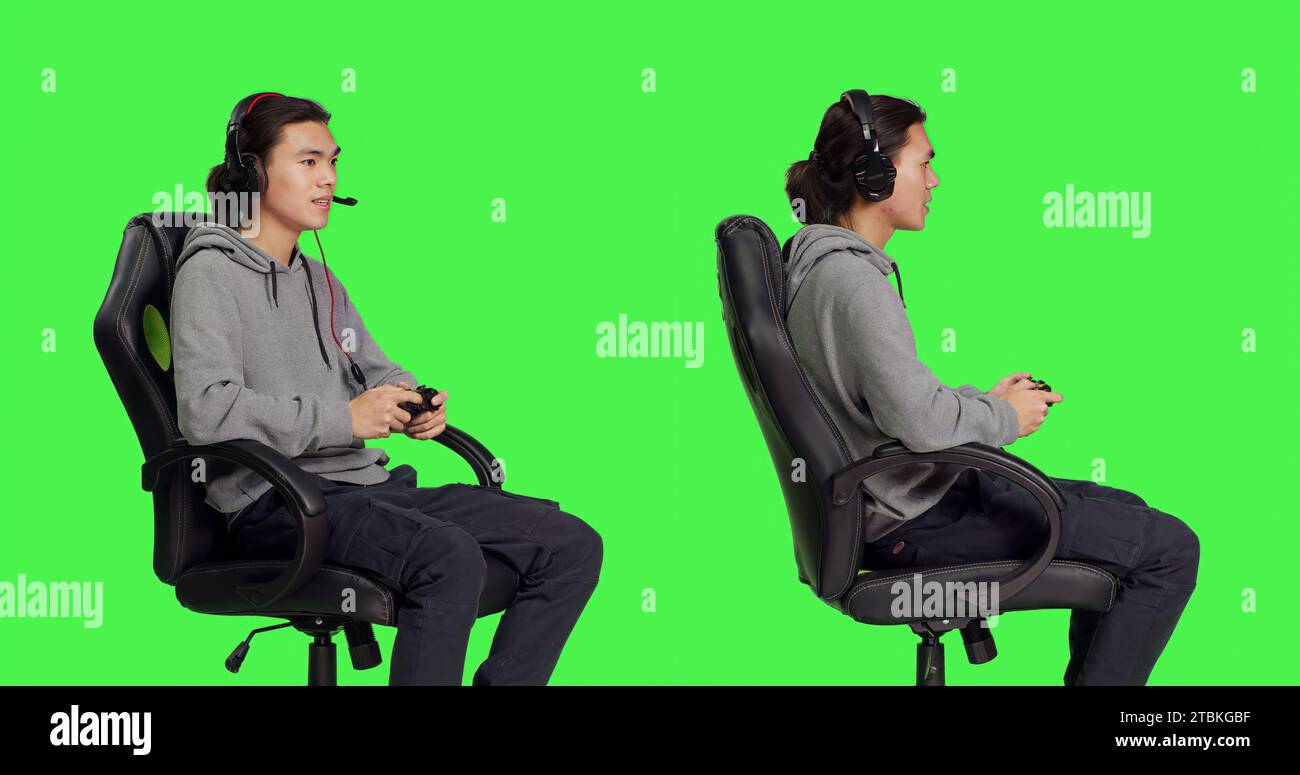Cheerful person enjoys online gameplay, sitting on gaming chair over ...