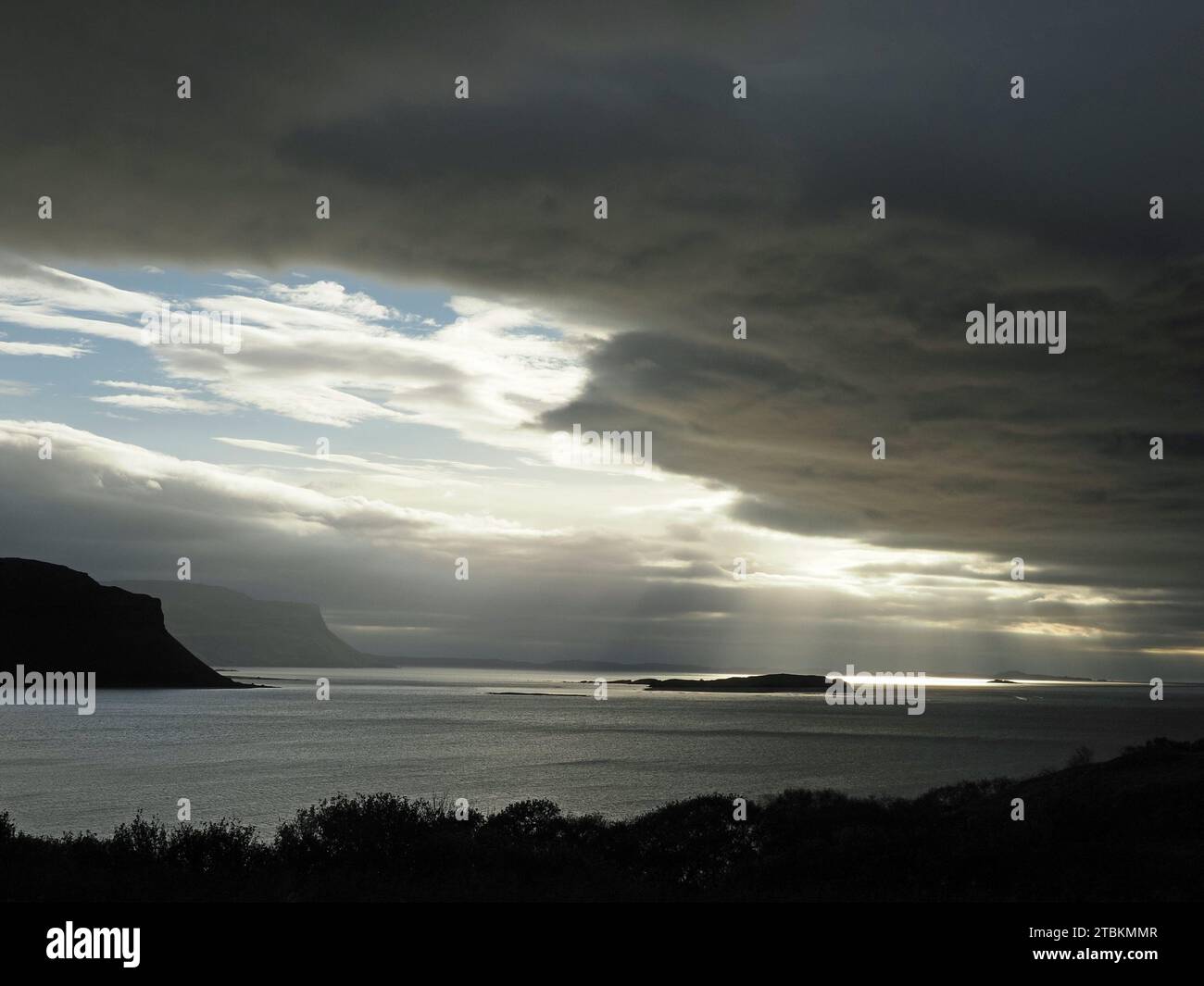 atmospheric seascape with spotlights of sunshine breaking through ...