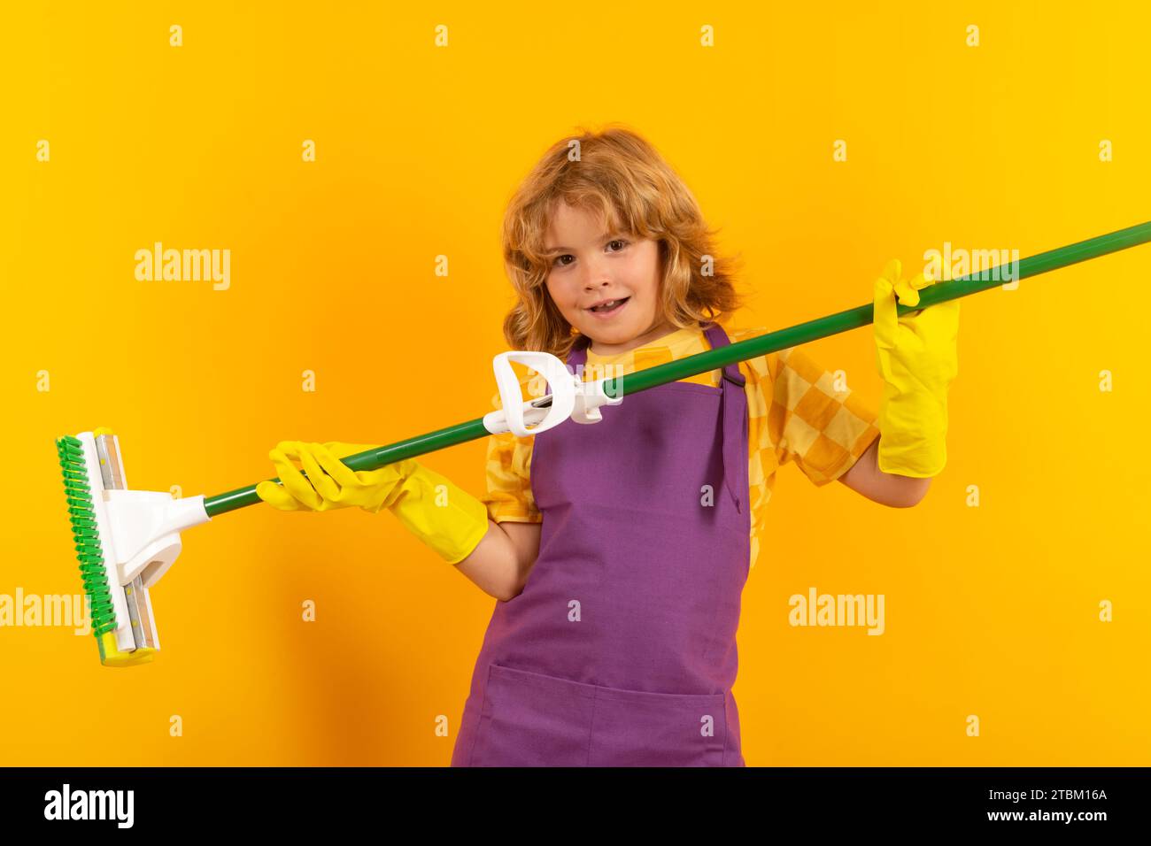 Little kid cleaning at home. Child doing housework having fun. Studio ...