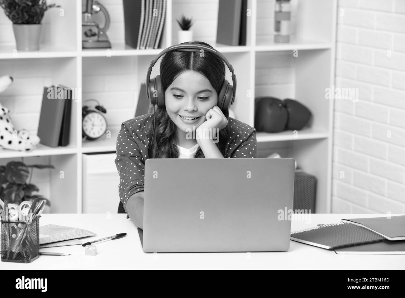 Kids computer school headphones Black and White Stock Photos & Images ...