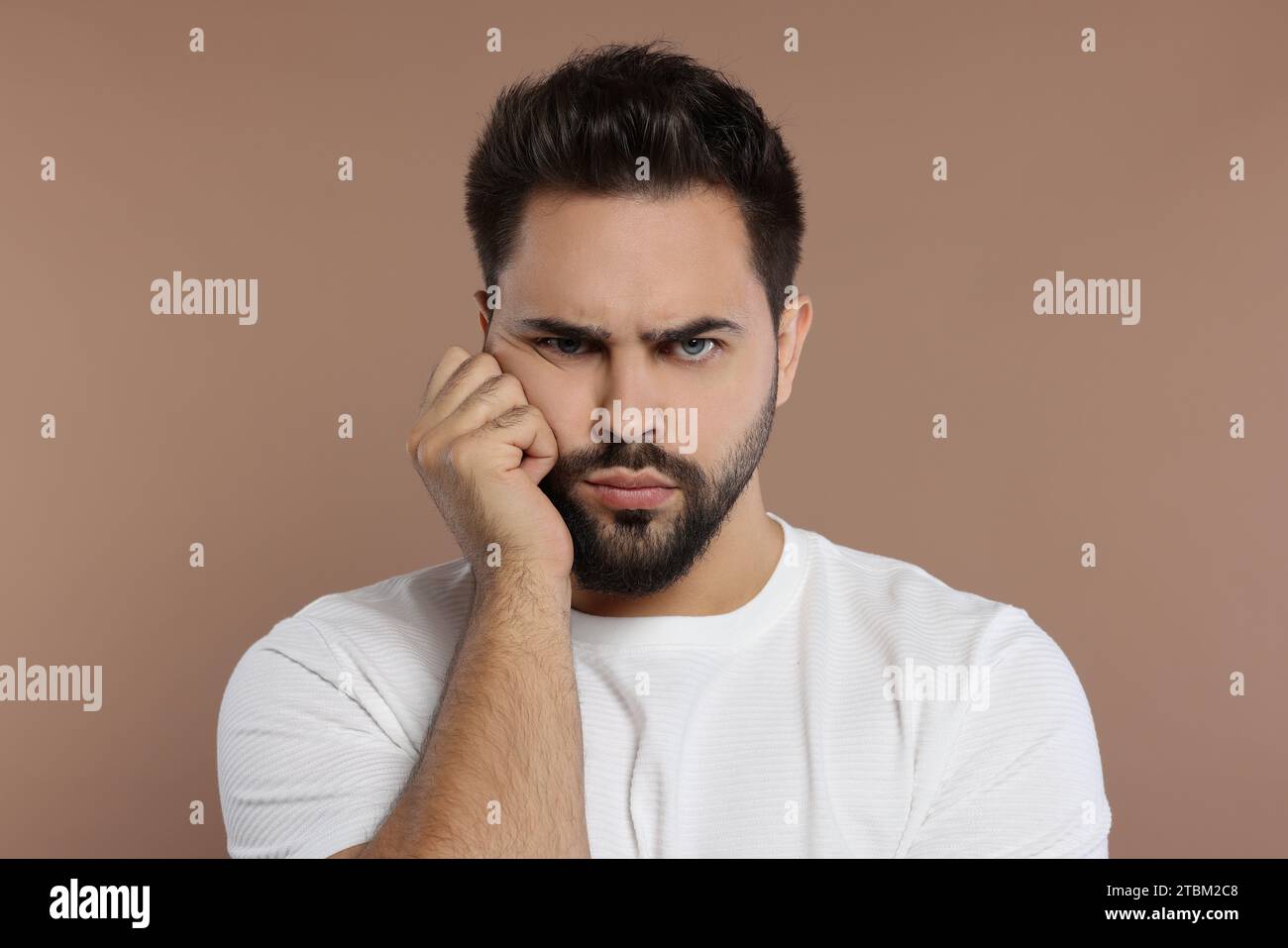 Portrait upset brunette man hi-res stock photography and images - Alamy