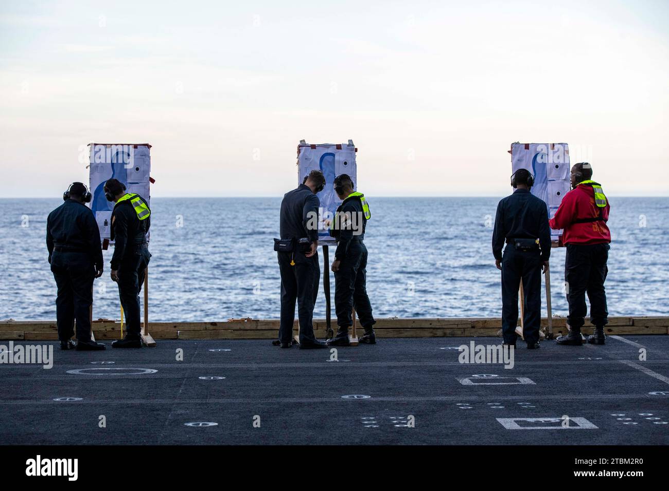 231204-N-ED228-1136 PACIFIC OCEAN (Dec. 4, 2023) Sailors tally scores ...