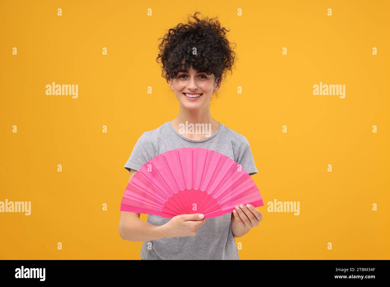 Hot day orange fan hi-res stock photography and images - Alamy