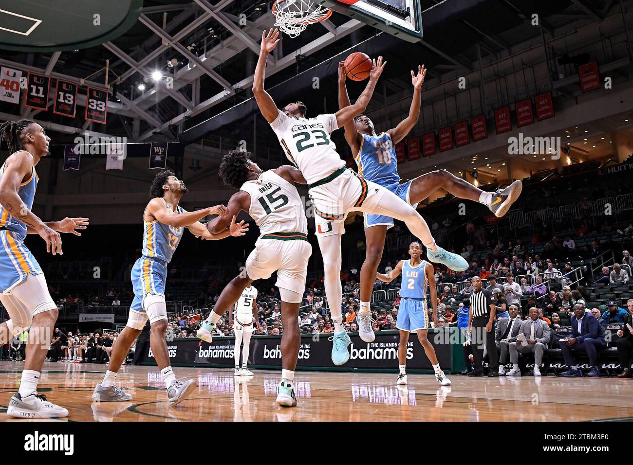 CORAL GABLES, FL - DECEMBER 06: Miami forward AJ Casey (23) attempts to ...