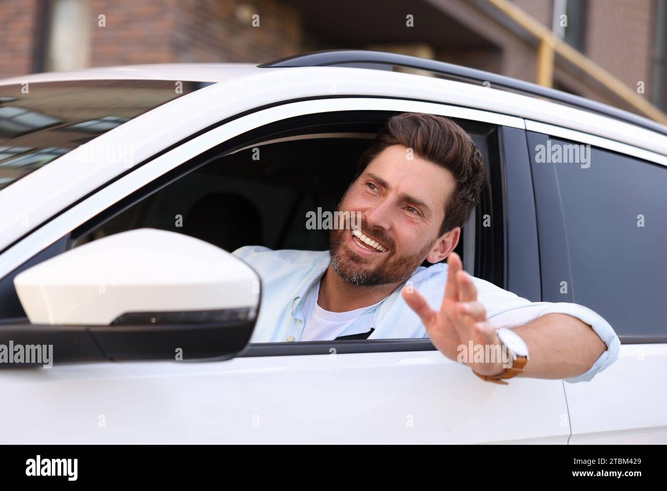Wave hand car window hi-res stock photography and images - Alamy