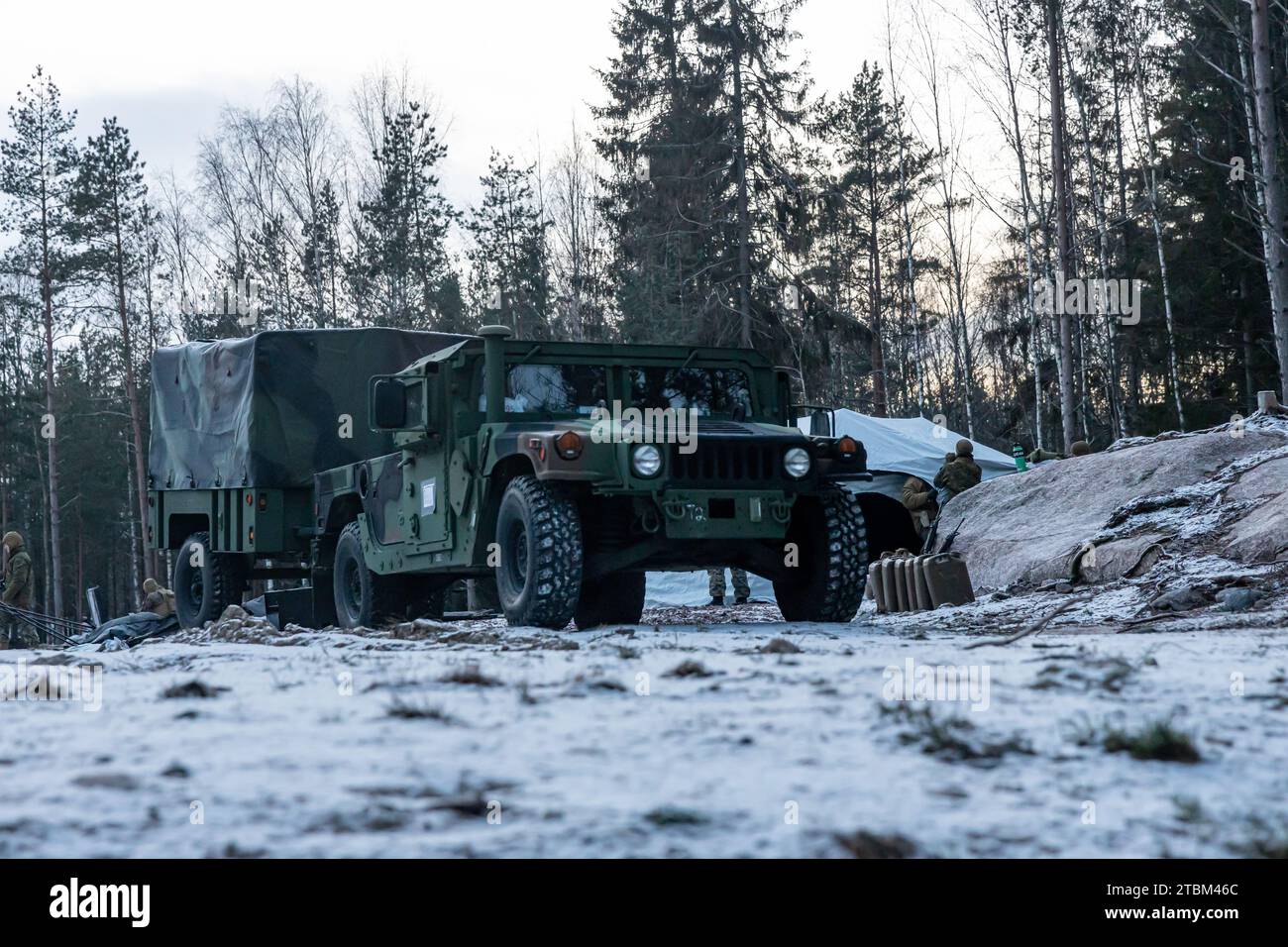 A U.S. Marine Corps M1151 Humvee is used to transport medical tents and ...