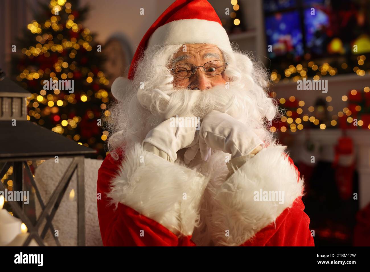 Portrait santa claus winking hi-res stock photography and images - Alamy