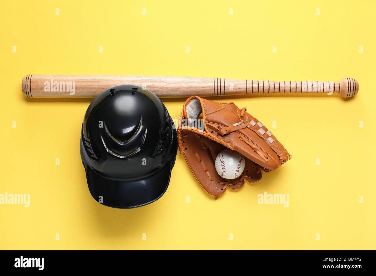 Baseball glove, bat, ball and batting helmet on yellow background, flat ...