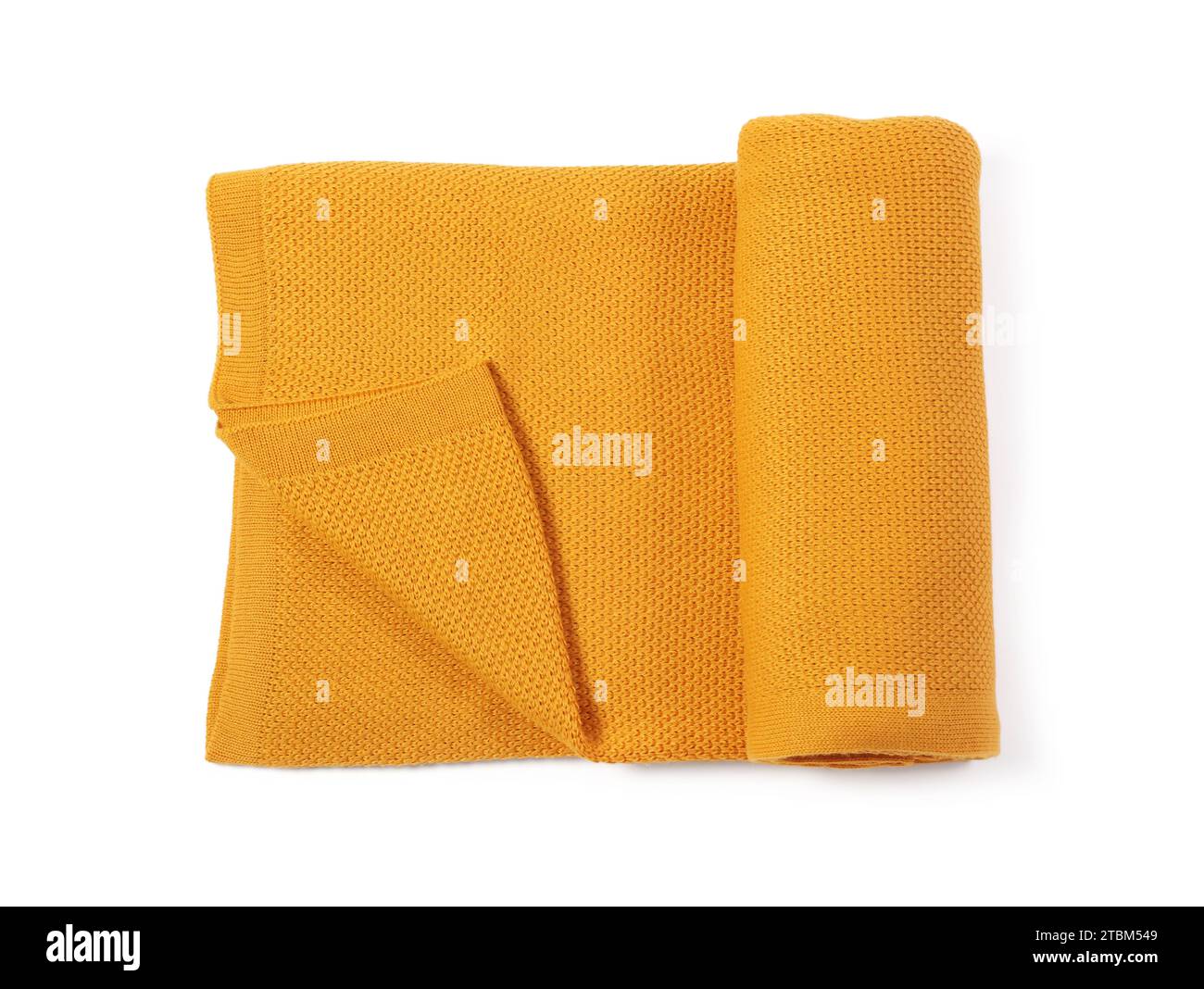 Beautiful yellow knitted blanket isolated on white, top view Stock ...