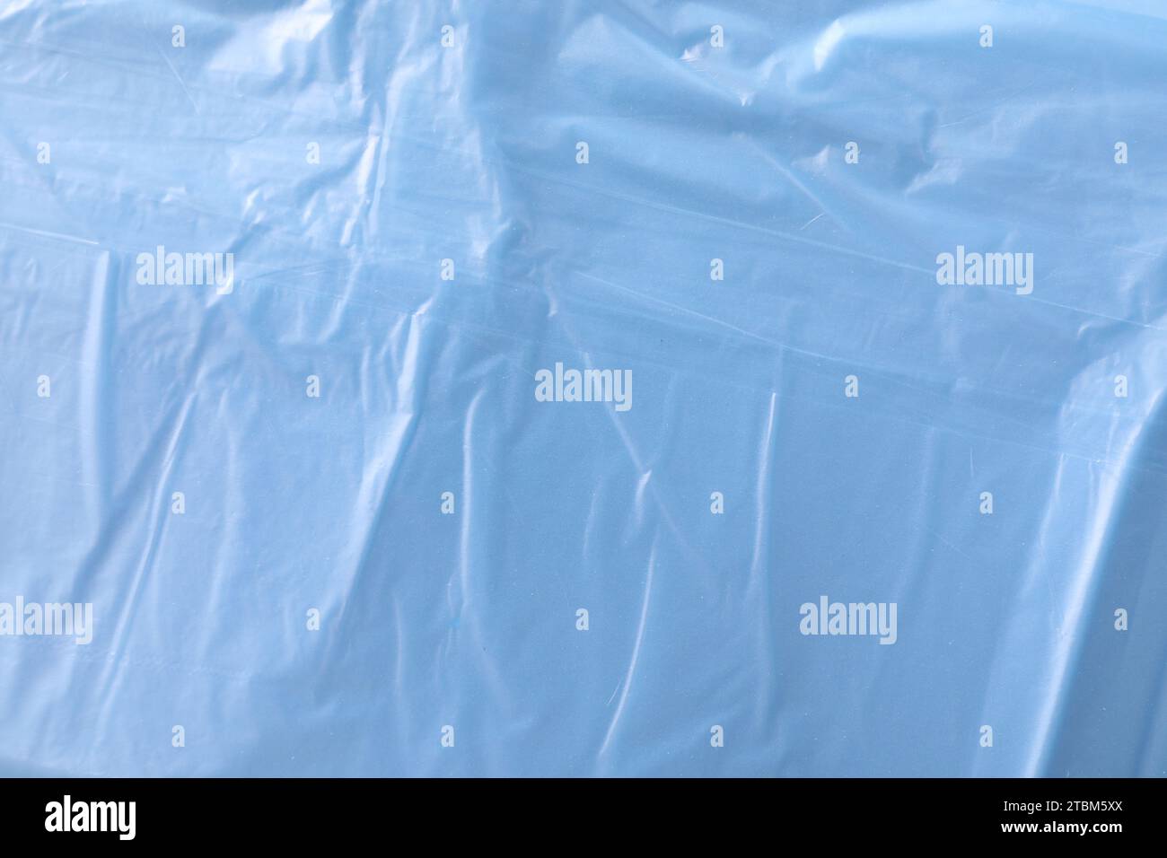Texture of light blue plastic bag as background, closeup Stock Photo ...