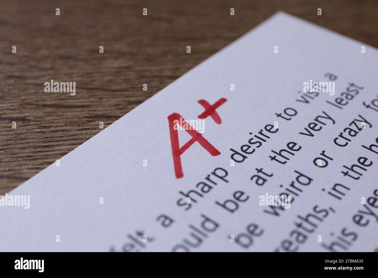 School grade. Sheet of paper with red letter A and plus symbol on ...