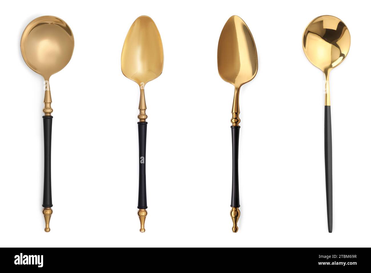 Different stylish golden spoons on white background Stock Photo - Alamy