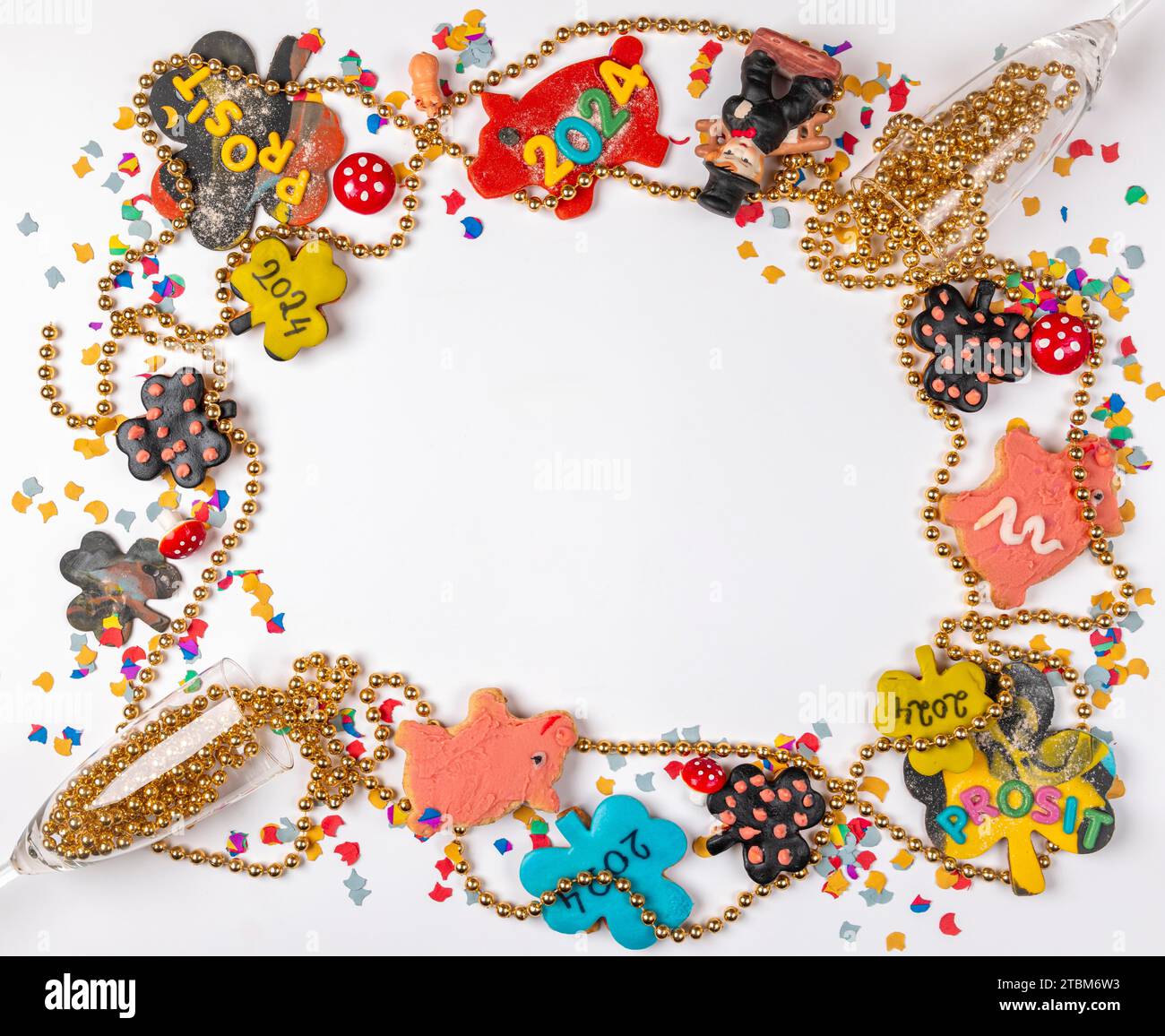 Lucky charms for New Year, frames, pigs, shamrocks, champagne glasses ...