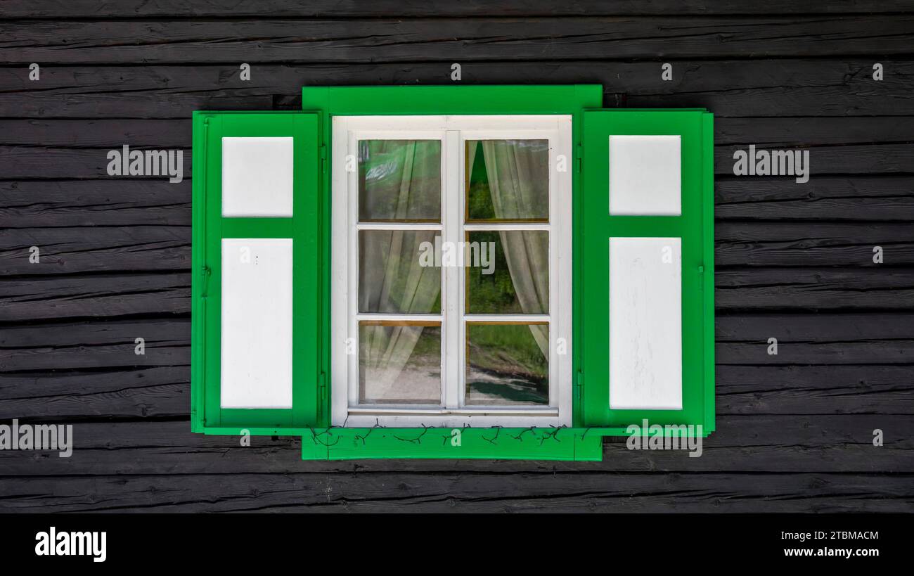 Old antique white vintage wooden window with green outline with ...