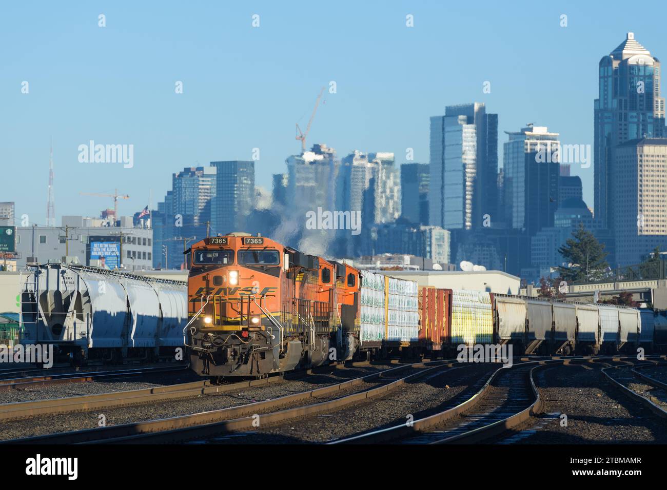 Seattle, WA, USA - October 29, 2023; BNSF freight train with cold morning departure in front of ...