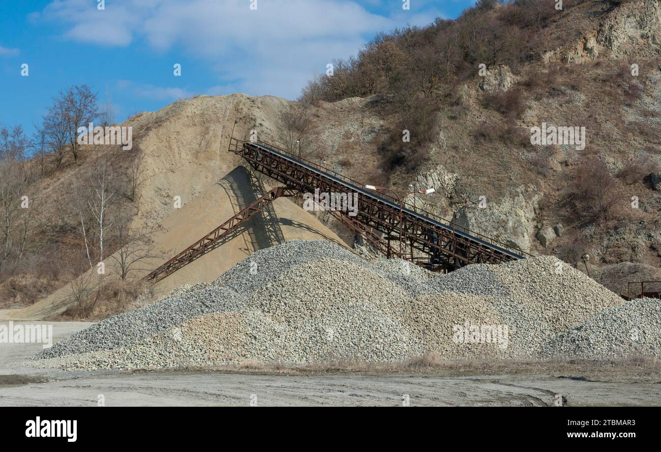 Conveyor belt at an old gravel quarry. Mining and quarrying equipment ...