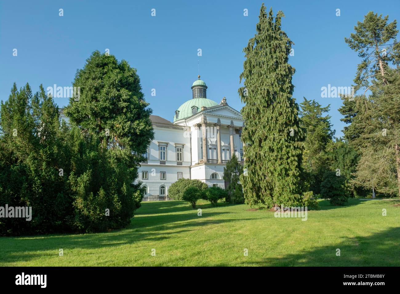 Classicist-style manor house and castle in Topolcianky park. Slovakia ...