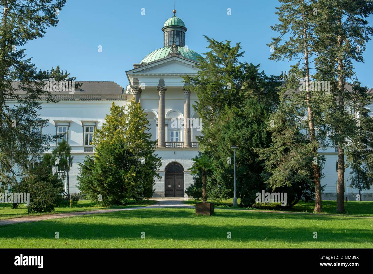 Classicist-style manor house and castle in Topolcianky park. Slovakia ...